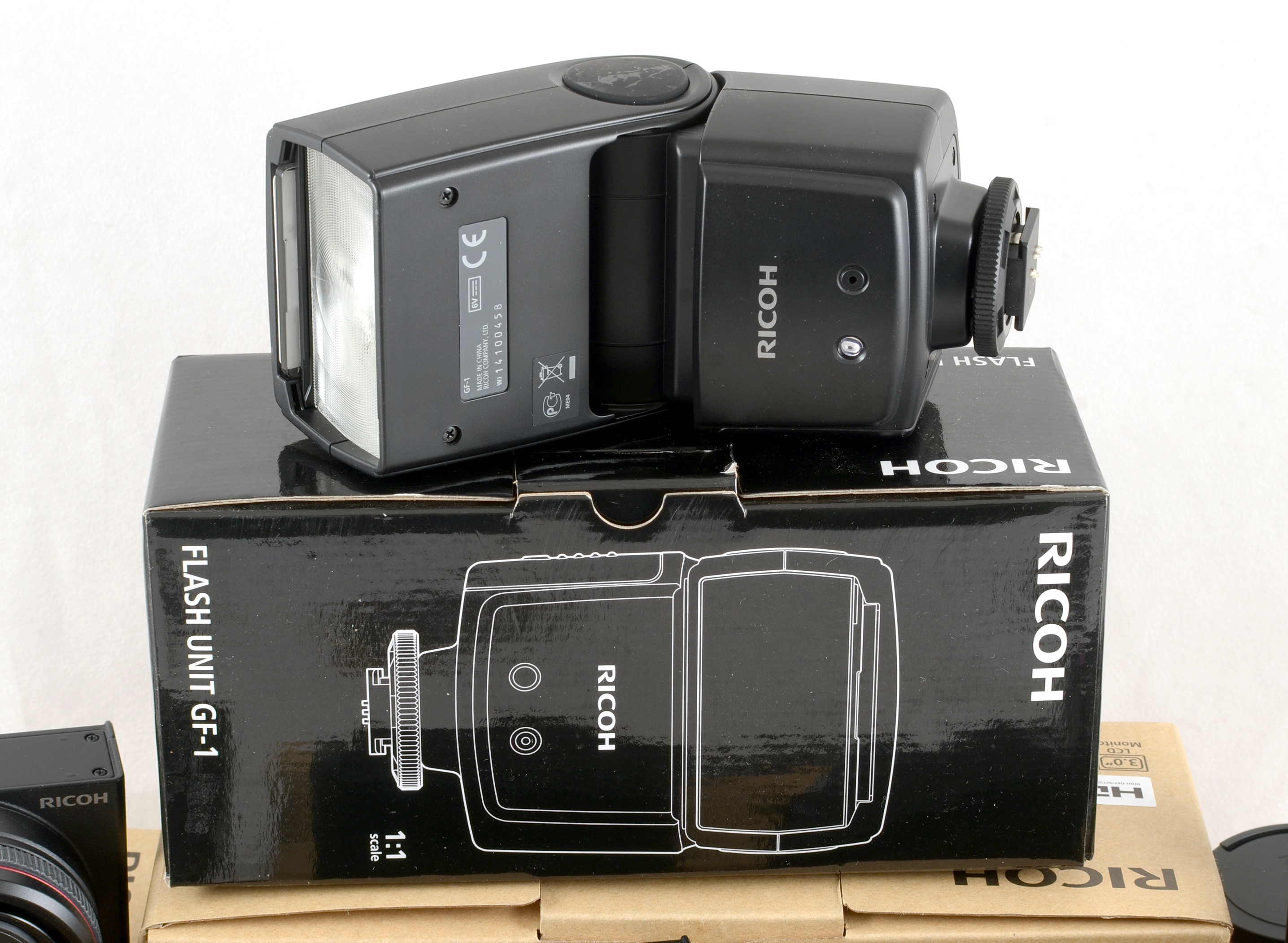 Lot 595 - Extensive 4-Lens Ricoh GXR Digital Camera
