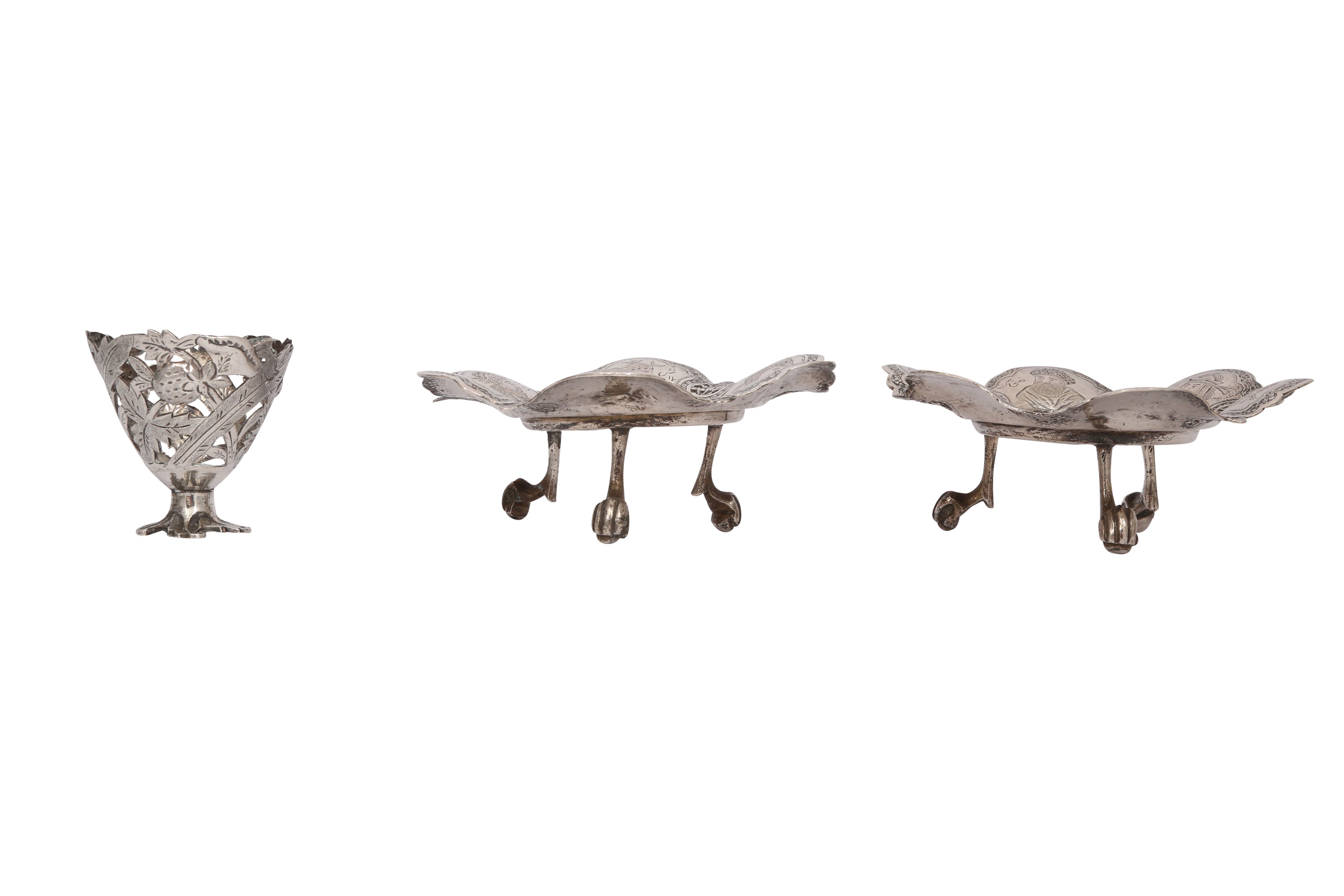 Lot 599 - TWO SMALL IRANIAN SILVER SAUCERS AND AN