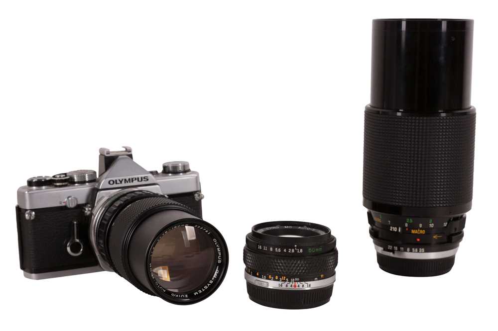 Lot 511 - A Olympus OM1n SLR Camera Outfit