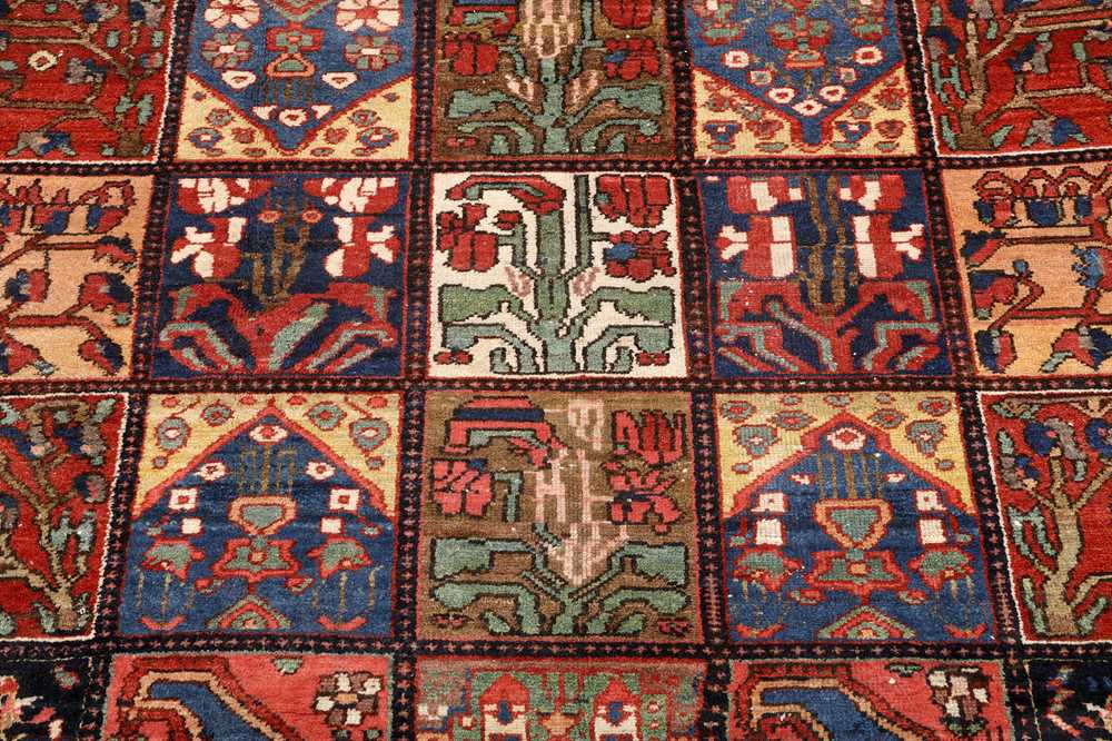 Lot 101 - AN ANTIQUE BAKHTIARI GARDEN DESIGN CARPET,