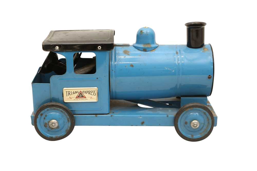Lot 194 - A TRIANG EXPRESS TIN PLATE TRAIN ENGINE