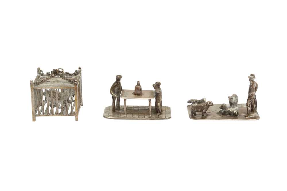 Lot 97 - A GROUP OF THREE DUTCH SILVER MINIATURES,