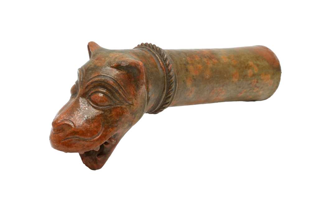 Lot 382 - A MAKARA-SHAPED POTTERY SPOUT
