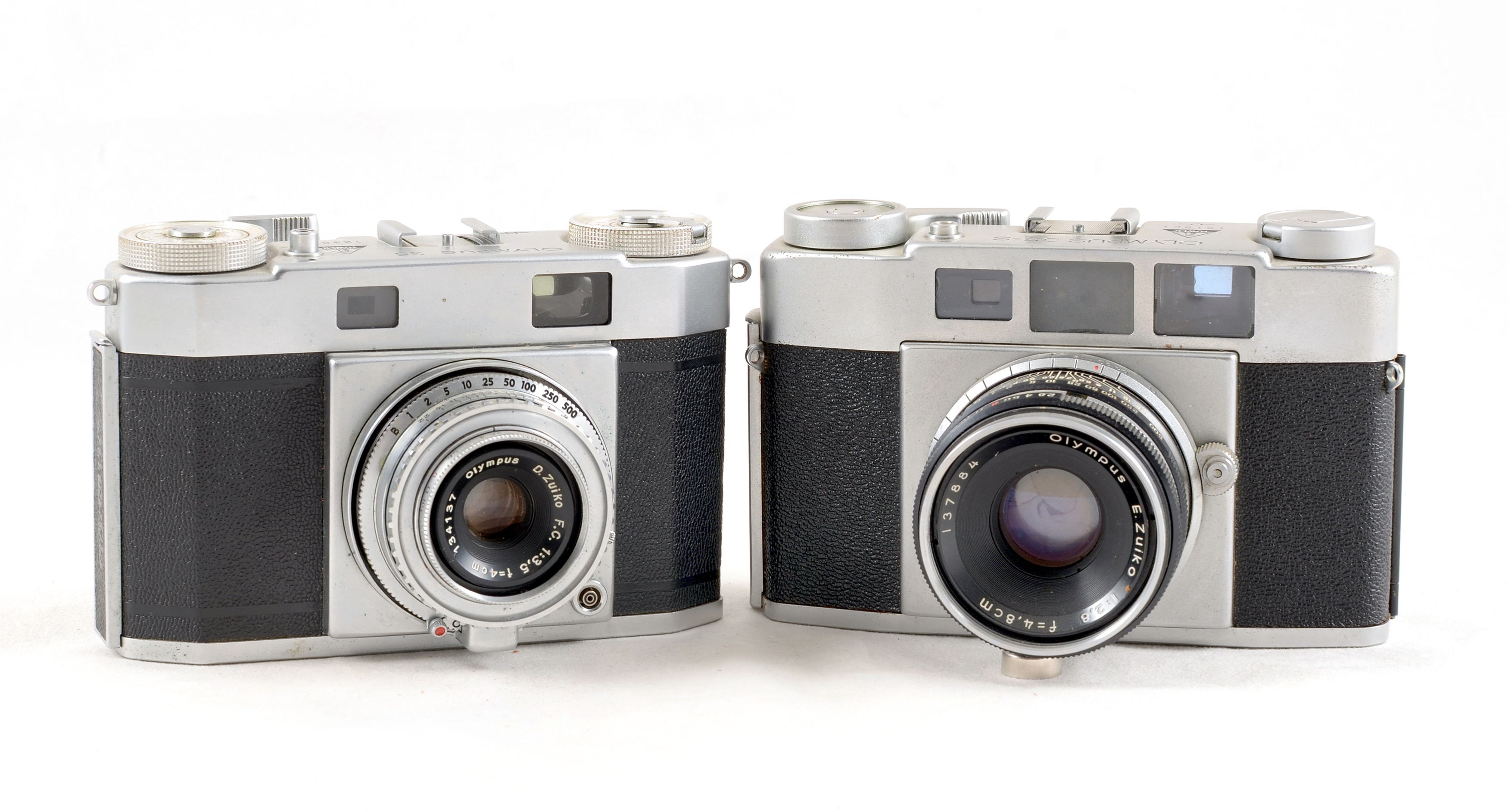 Lot 91 - A Rare Pair of Tower Branded Olympus 35