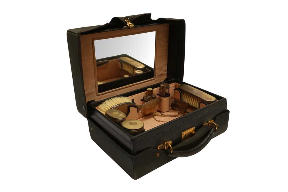 Lot 15 - A CASED GEORGE VI STERLING SILVER GILT FITTED