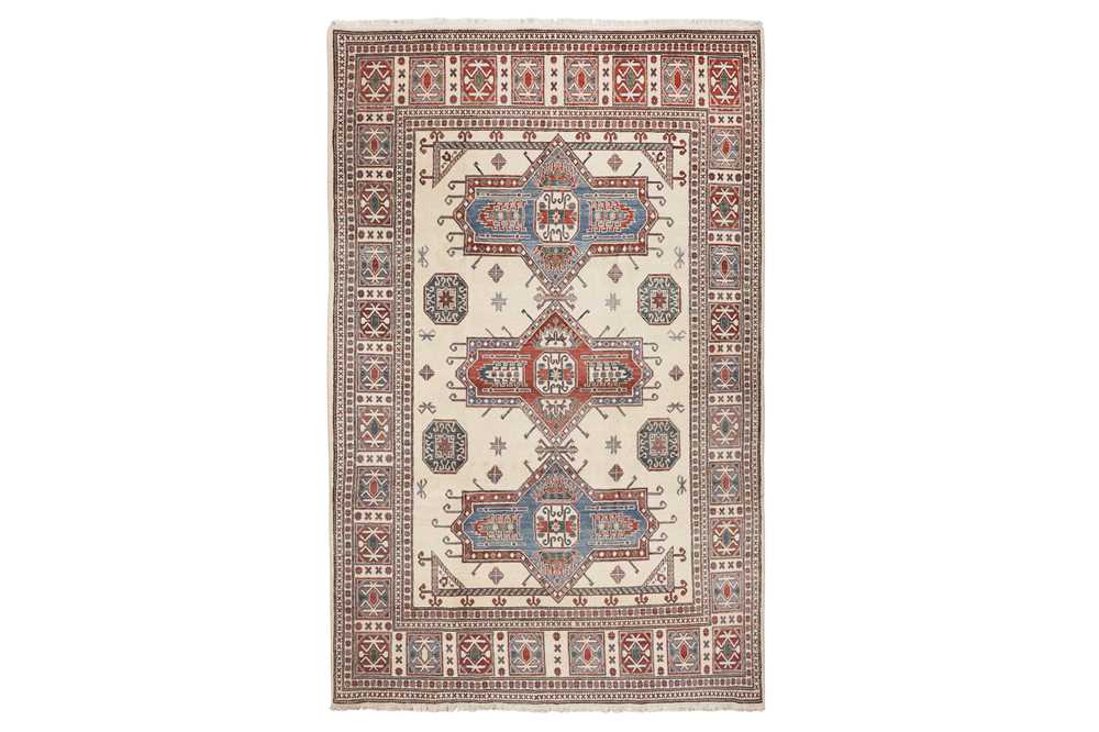 Lot 31 - A FINE KAZAK DESIGN CARPET