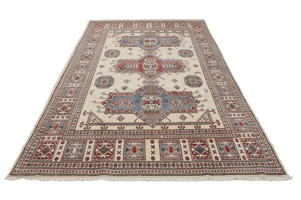 Lot 31 - A FINE KAZAK DESIGN CARPET