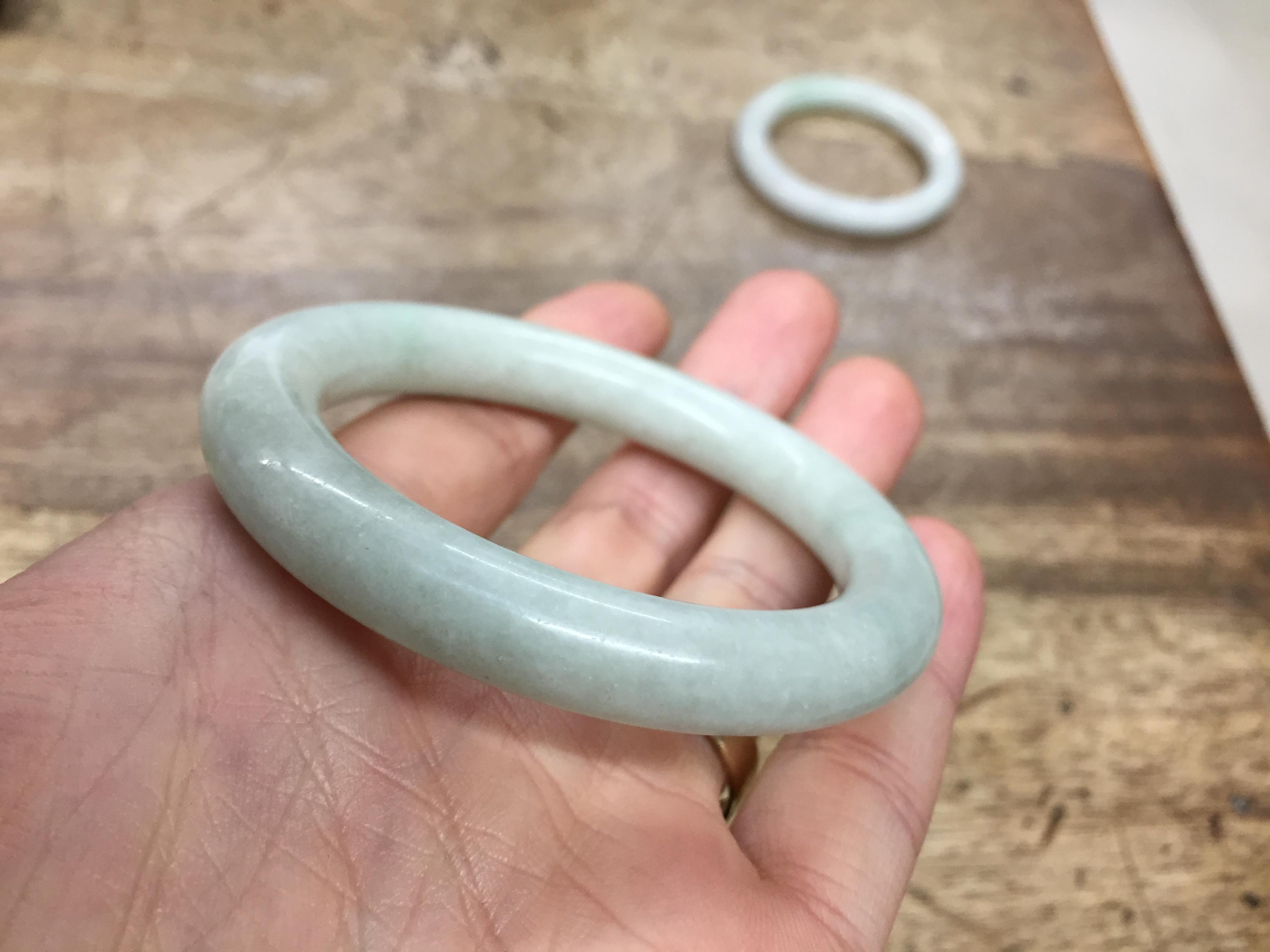 Lot 700 - TWO CHINESE JADE BANGLES