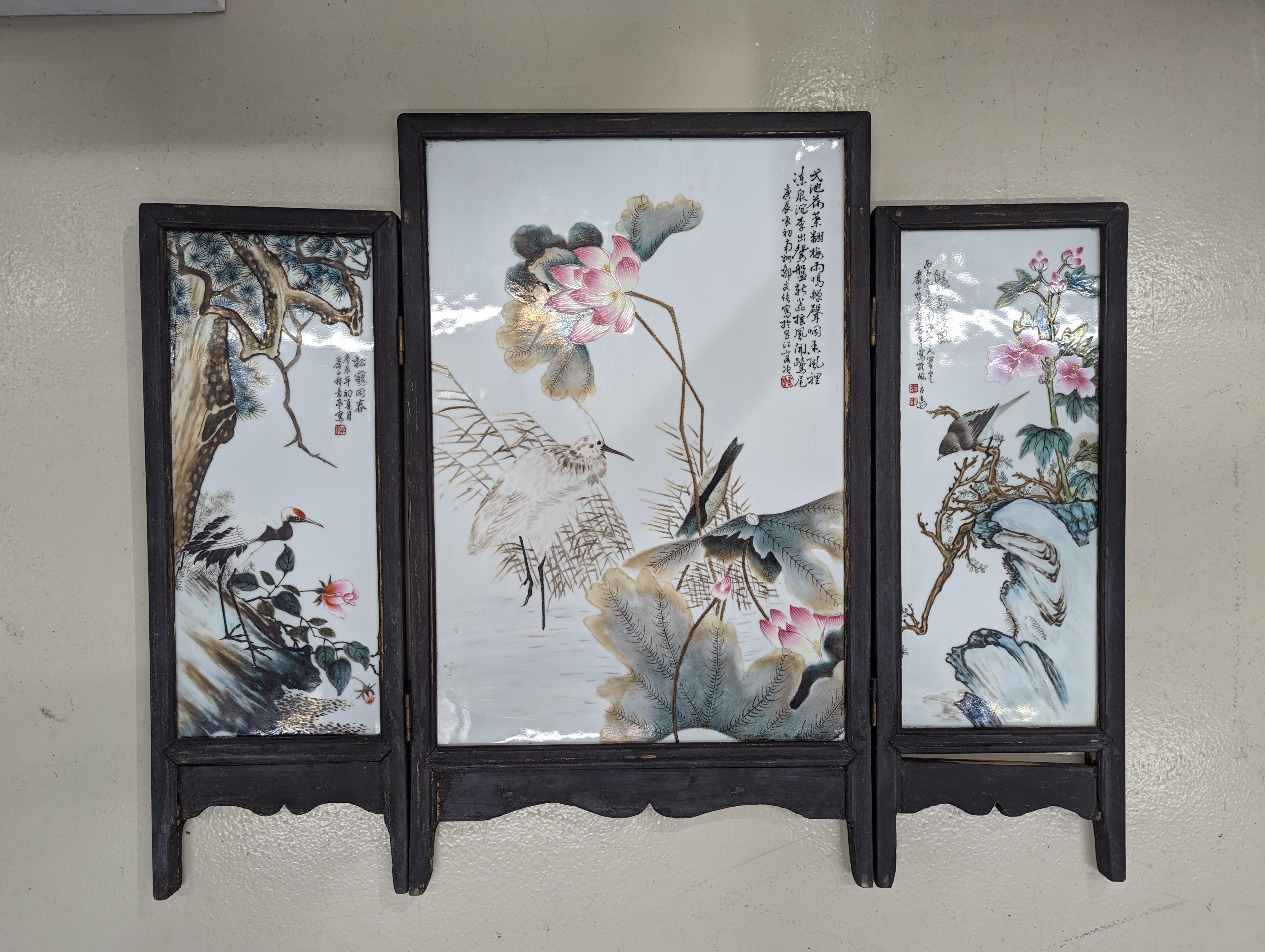 Lot 735 - A CHINESE FAMILLE-ROSE TRIPTYCH TABLE SCREEN