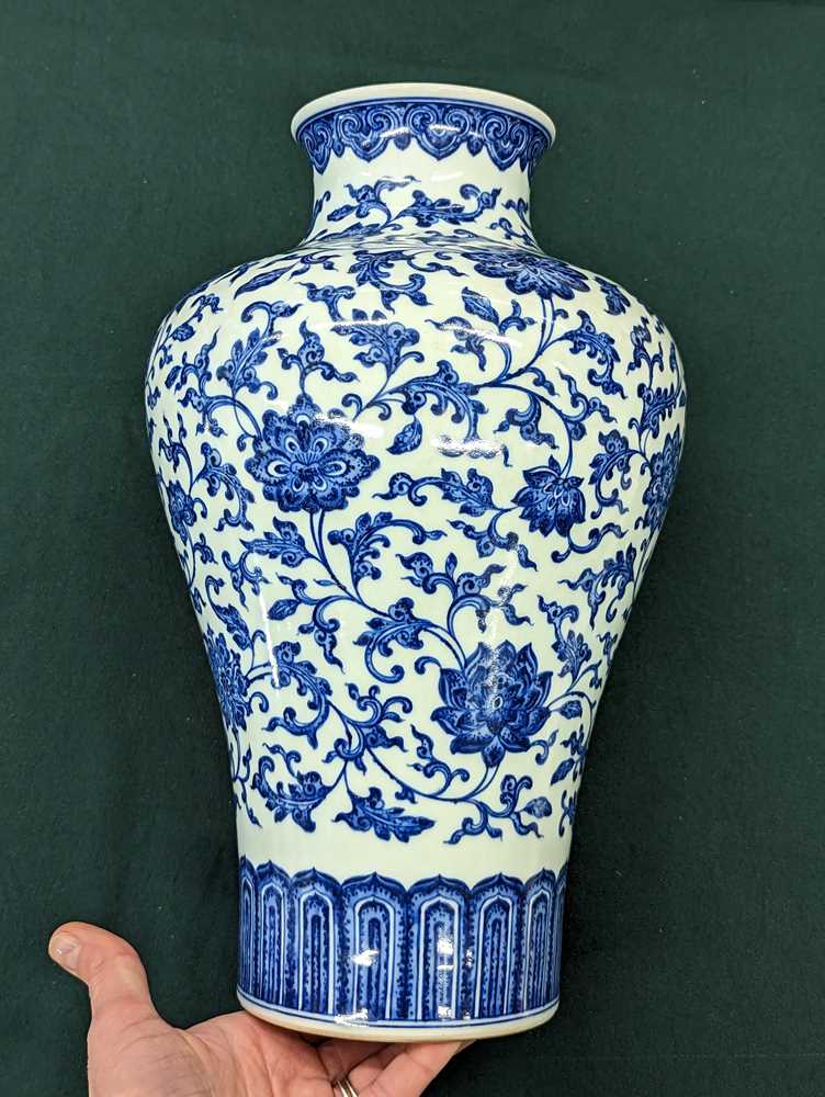 Lot 918 - A CHINESE BLUE AND WHITE 'LOTUS SCROLL' VASE