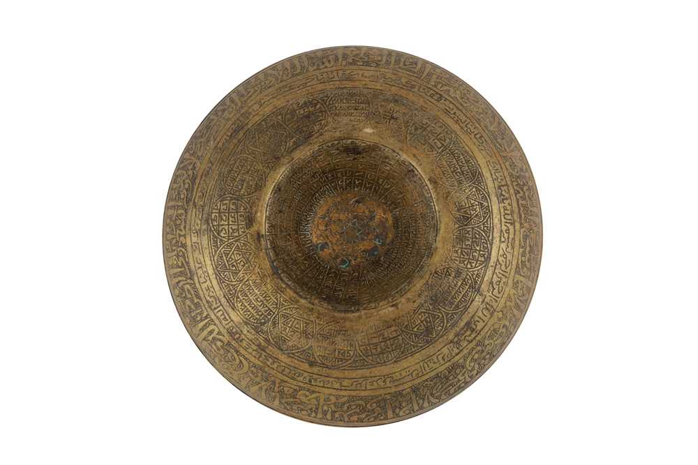 Lot 125 - AN ENGRAVED BRASS 'MAGIC' BOWL WITH THE