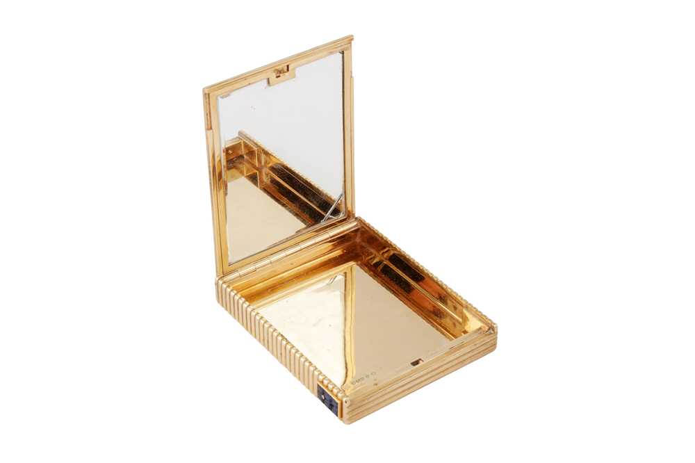 Lot 59 - Cartier | A gold and sapphire compact,
