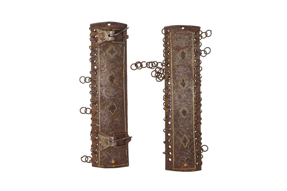 Lot 181 - TWO GOLD-DAMASCENED STEEL ARMOUR PLATES