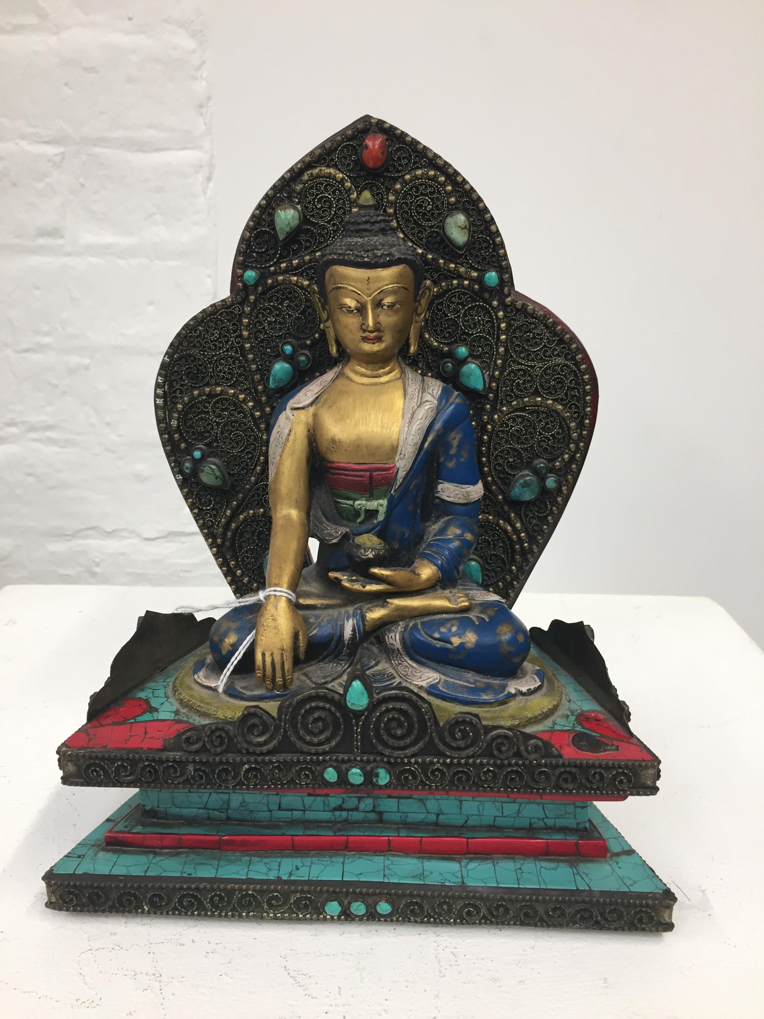 Lot 59 - A NEPALESE PAINTED BRONZE FIGURE OF BUDDHA