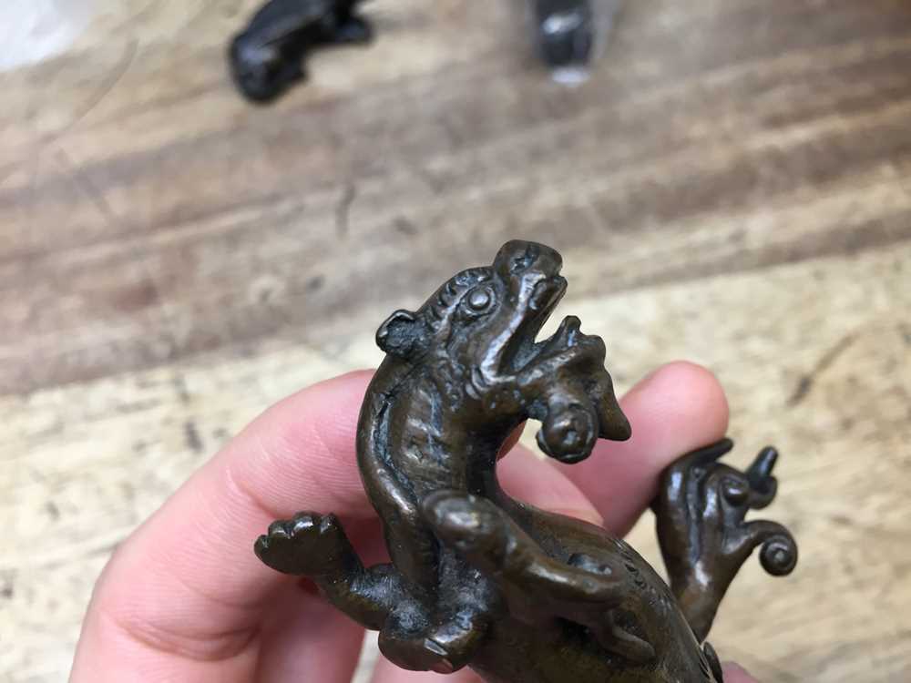 Lot 544 - TWO CHINESE BRONZE SCROLL WEIGHTS