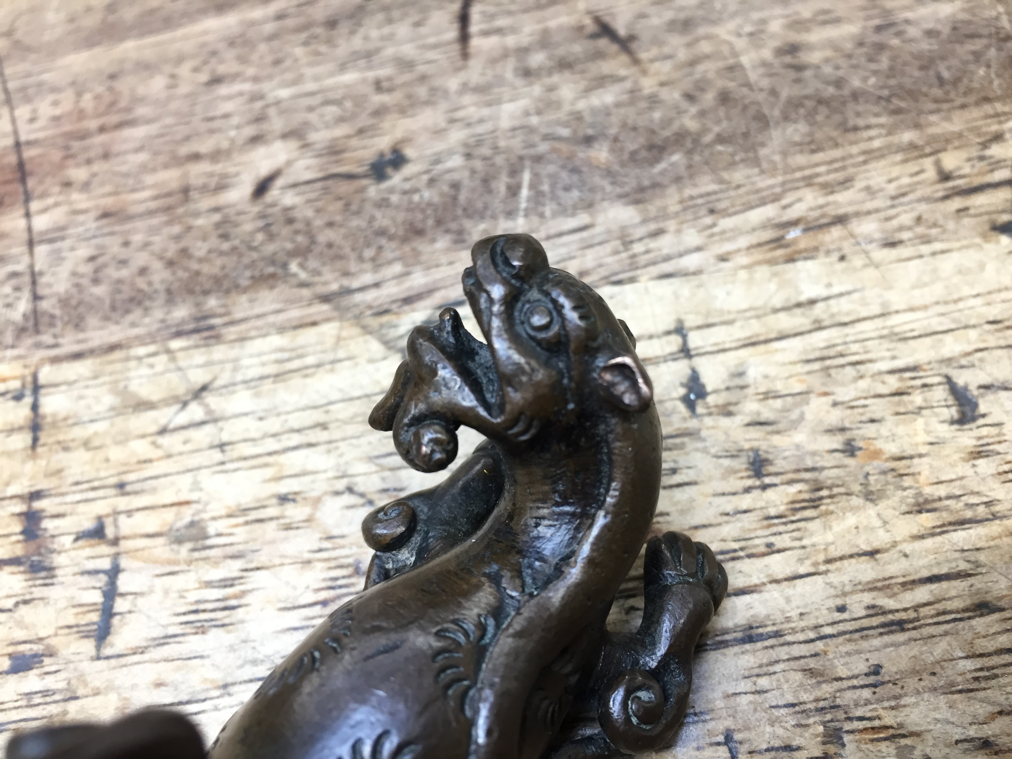 Lot 544 - TWO CHINESE BRONZE SCROLL WEIGHTS