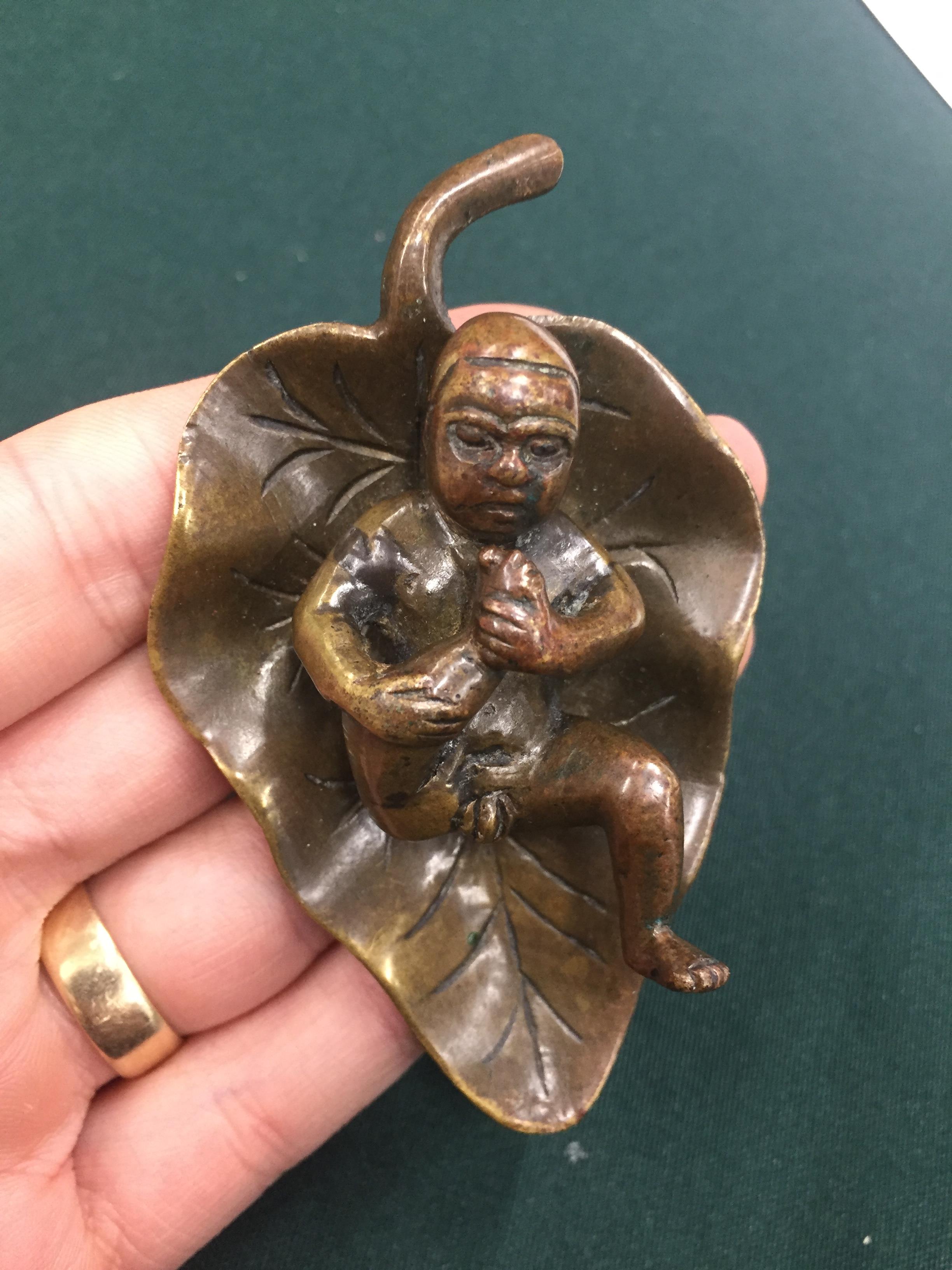 Lot 534 - TWO CHINESE BRONZE SCROLL WEIGHTS