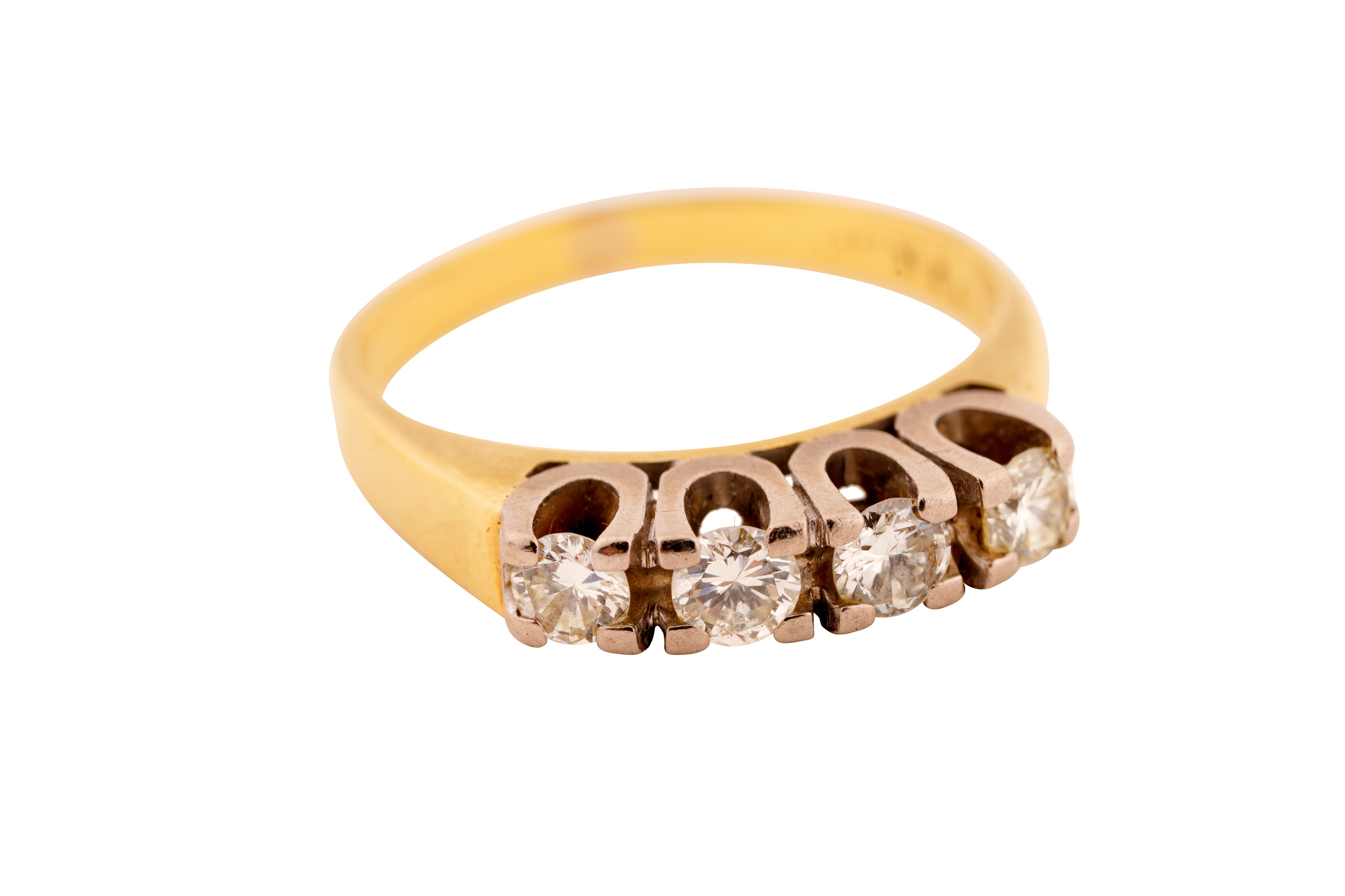 Lot 1011 - A DIAMOND FOUR-STONE RING