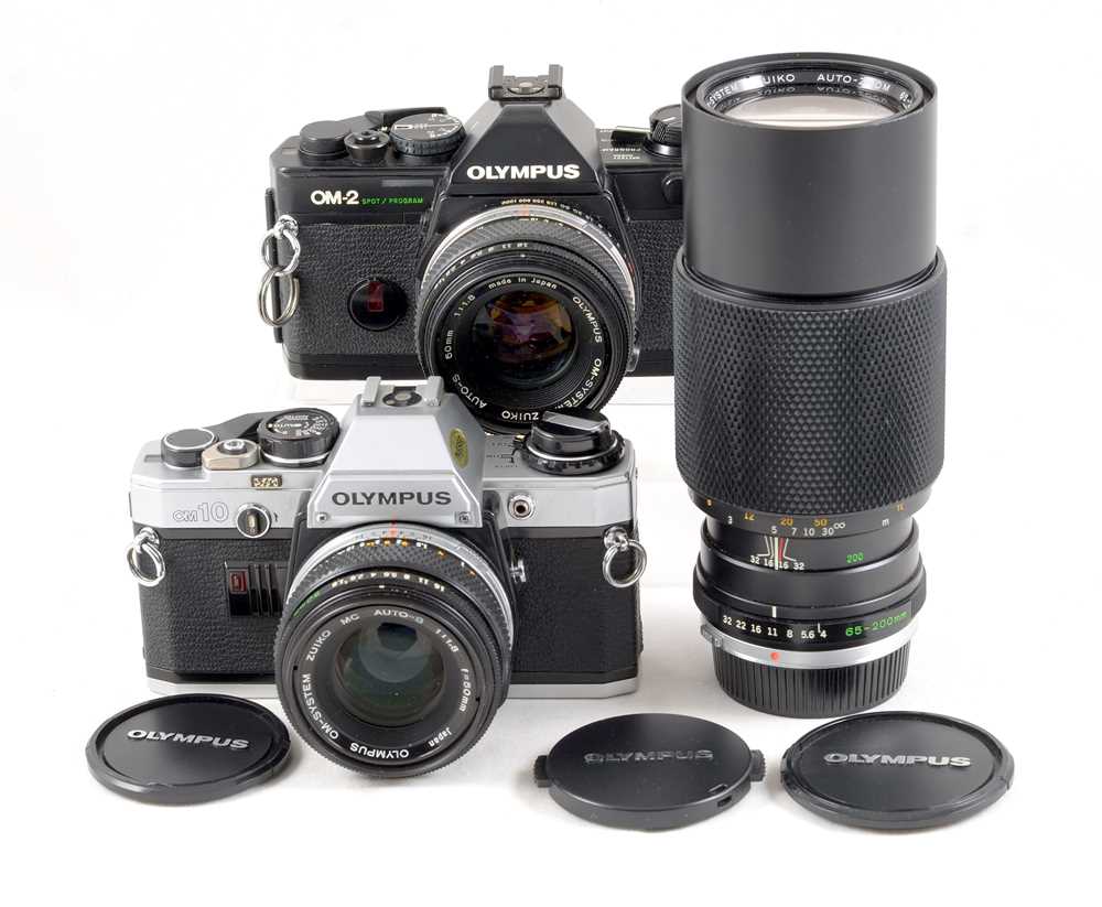 Lot 66 - An Olympus OM2 Spot Program.