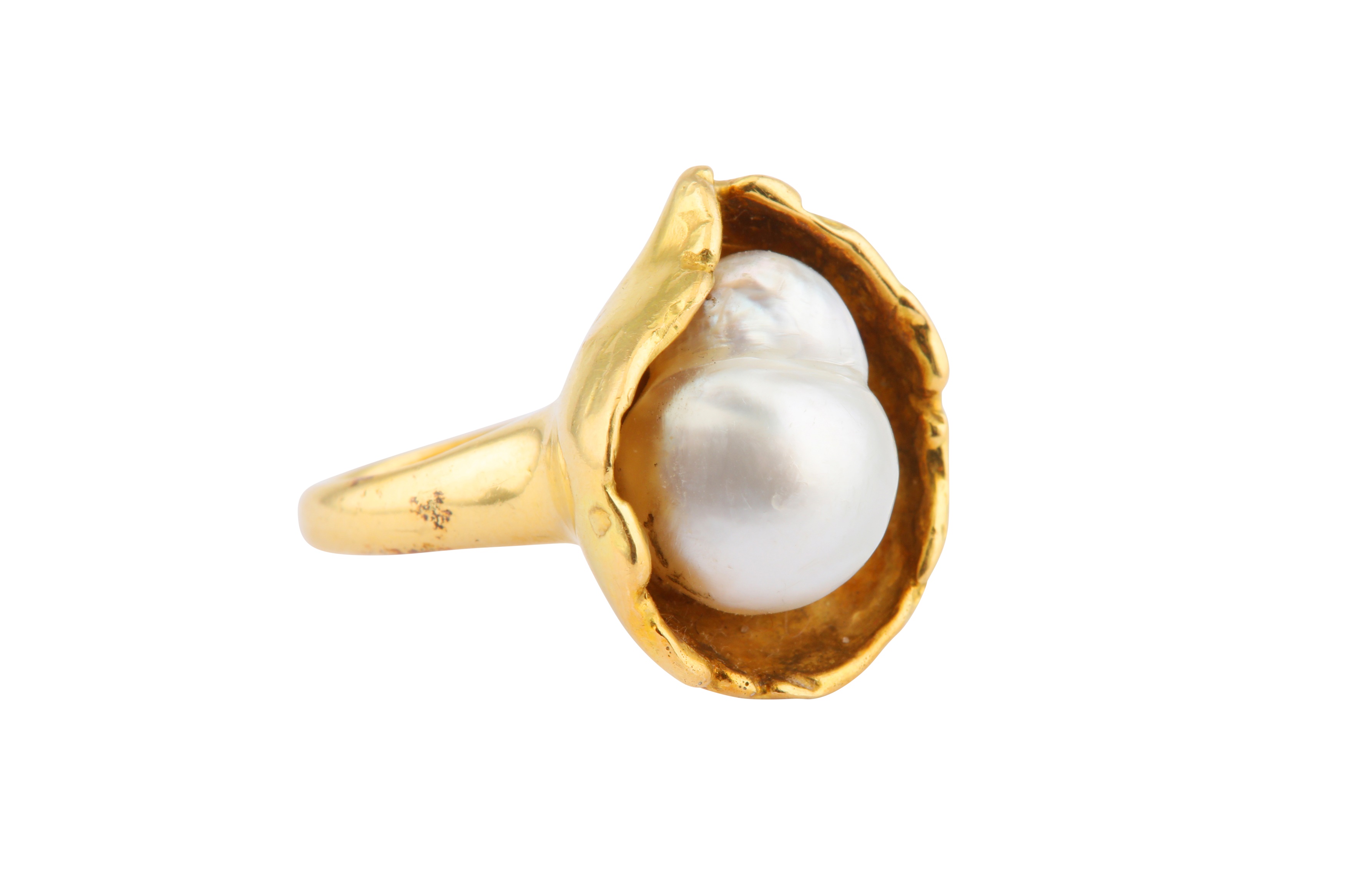 Lot 183 - A CULTURED BAROQUE PEARL RING BY JOHN DONALD,