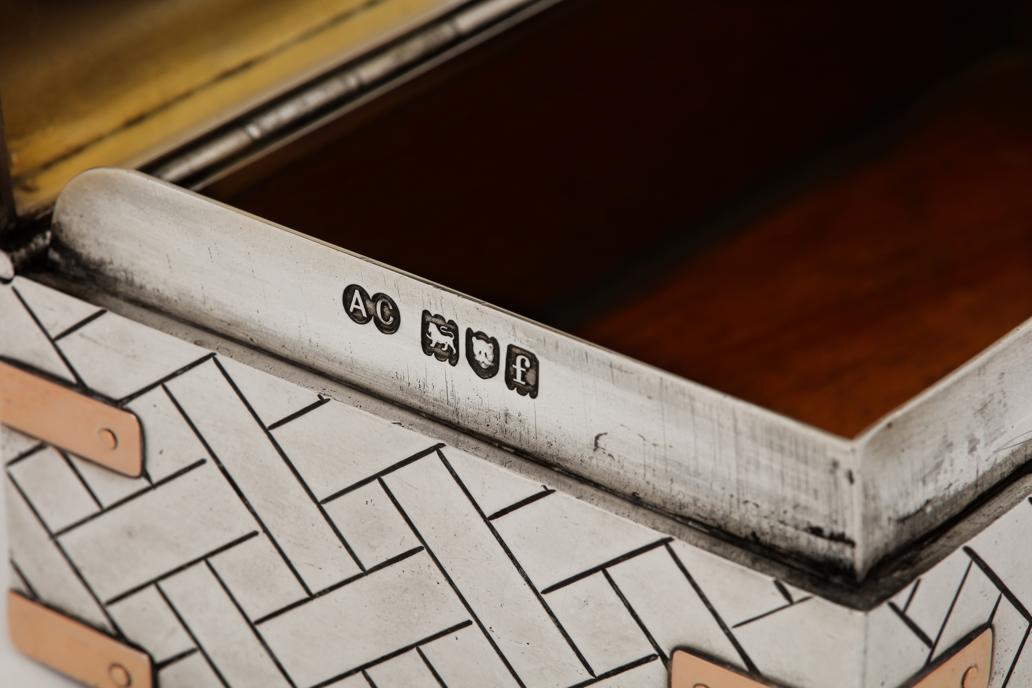 Lot 3 - An Edwardian gold mounted sterling silver