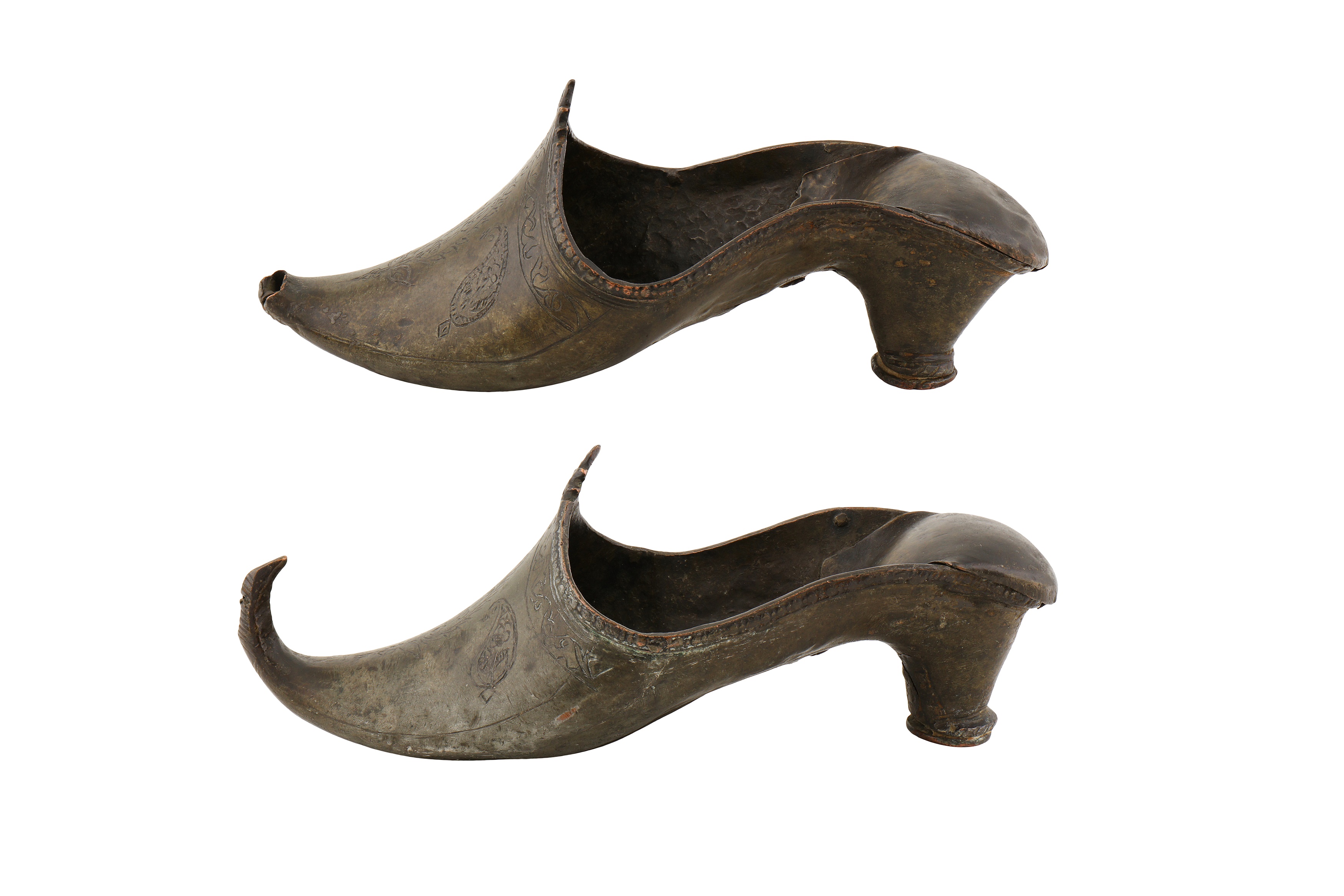 Lot 398 - A PAIR OF DECORATIVE QAJAR METAL SLIPPERS