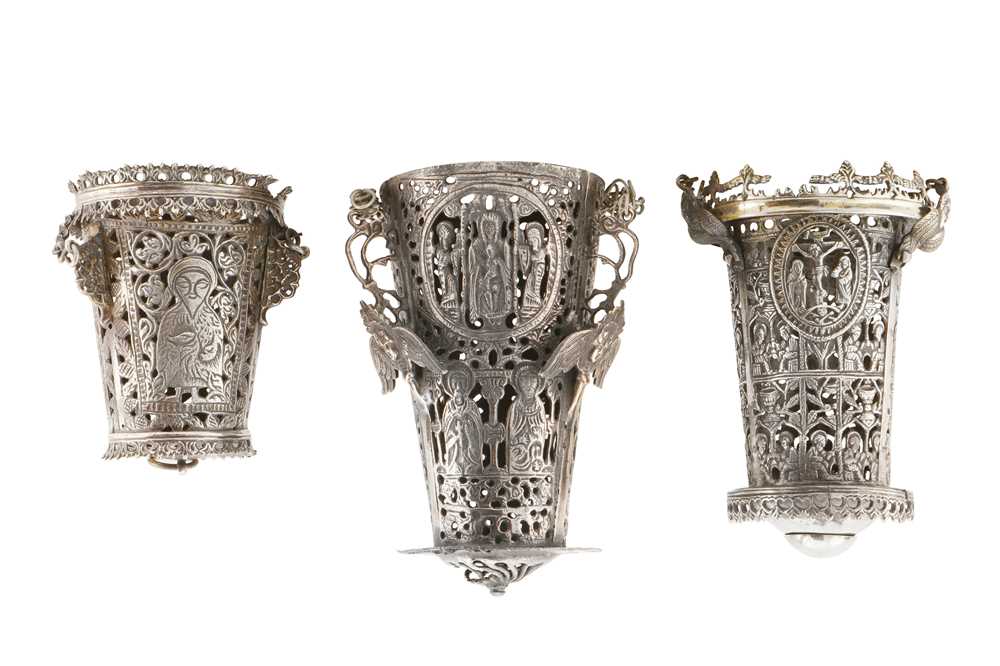 Lot 292 - THREE WHITE METAL OPENWORK SANCTUARY LAMPS