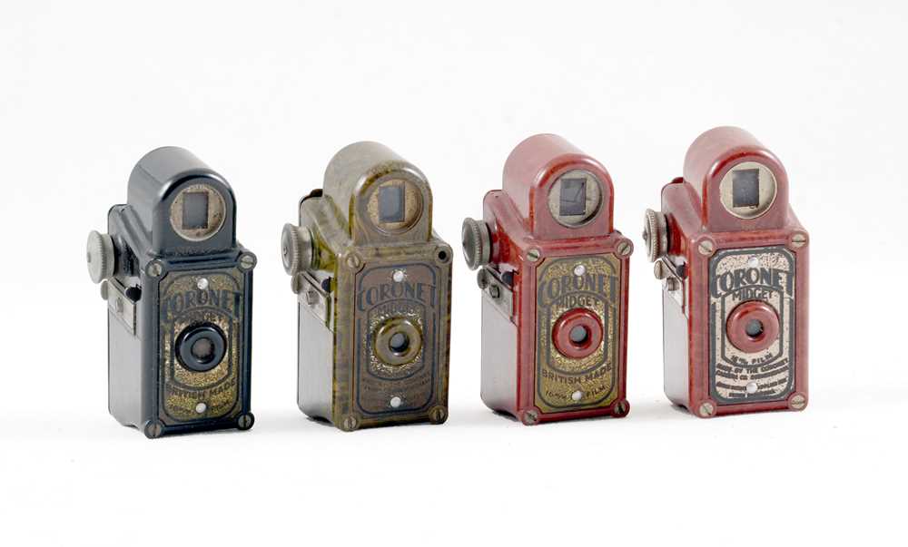 Lot 97 - Four Coronet Midget Sub-Miniature Cameras.