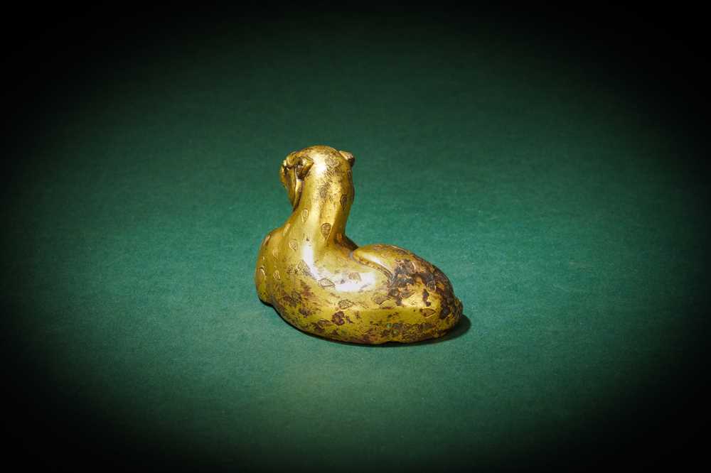 Lot 191 - A CHINESE GILT-BRONZE 'LEOPARD' FIGURE