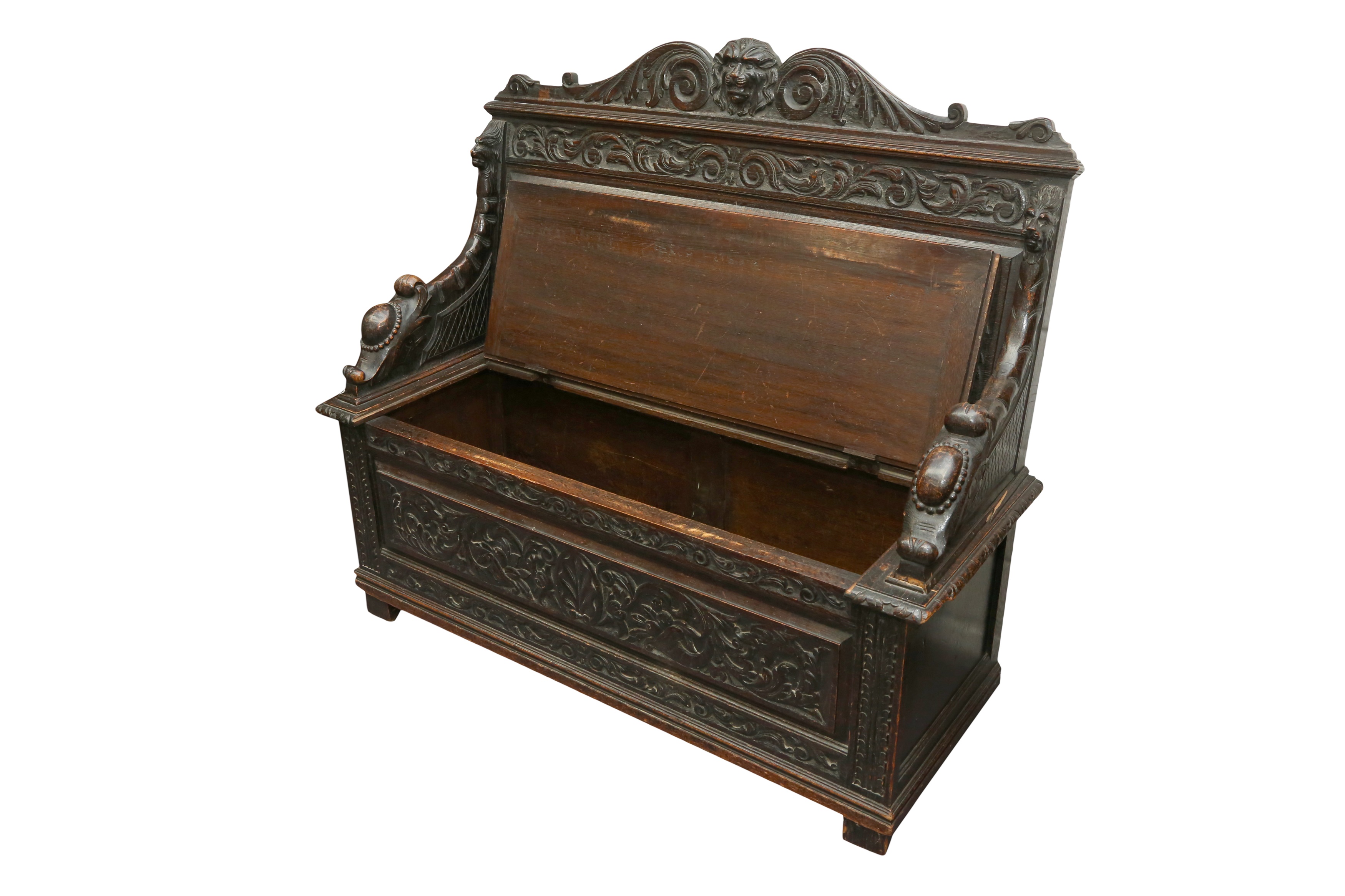 Lot 427 - A 19TH CENTURY CARVED HALL SETTLE