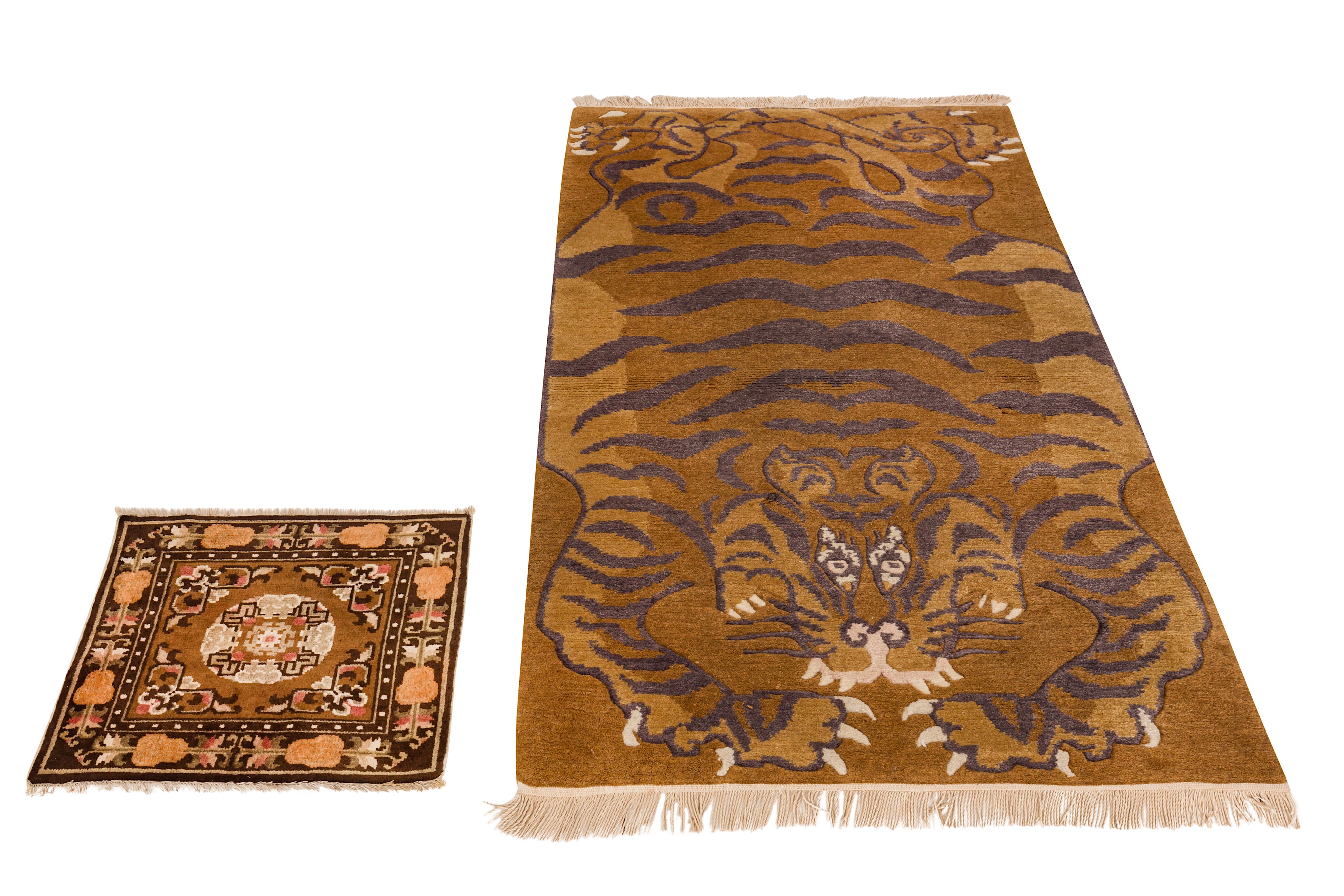 Lot 47 - A FINE TIBETAN TIGER RUG AND TIBETAN MAT