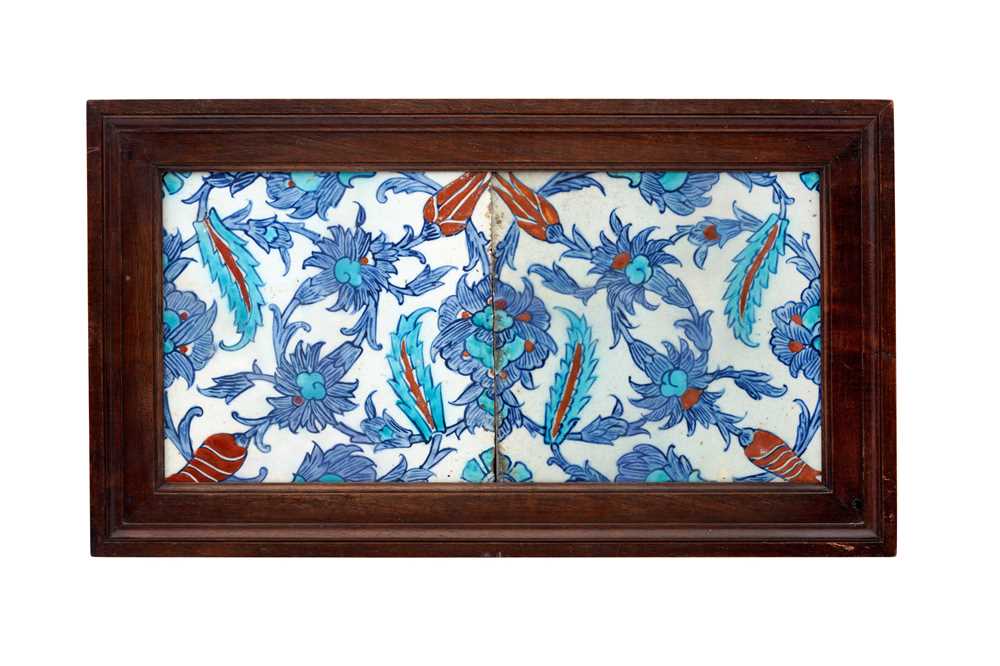 Lot 399 - A PANEL OF TWO IZNIK POTTERY TILES WITH SAZ