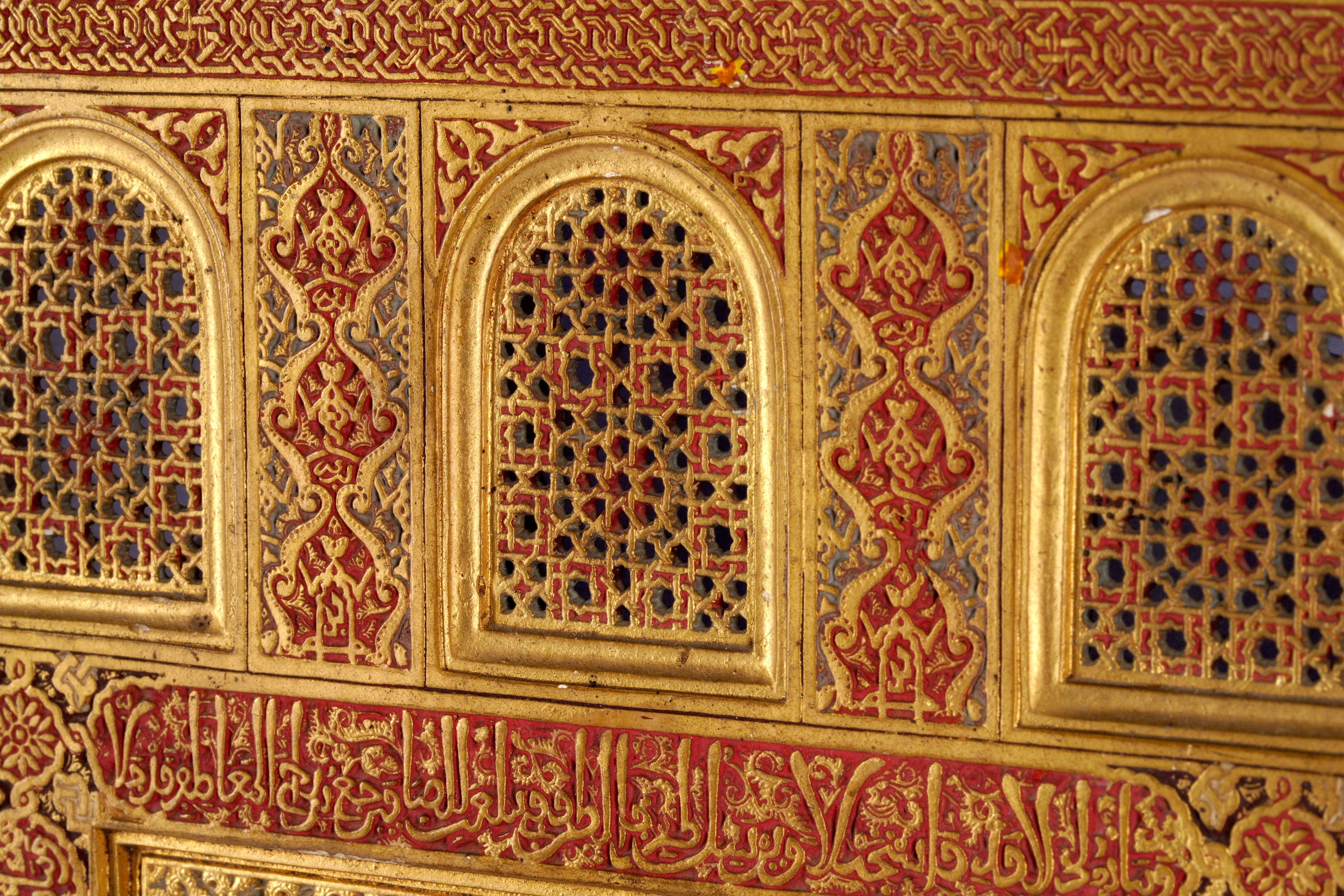 Lot 423 - A GILT AND POLYCHROME-PAINTED PLASTER RELIEF