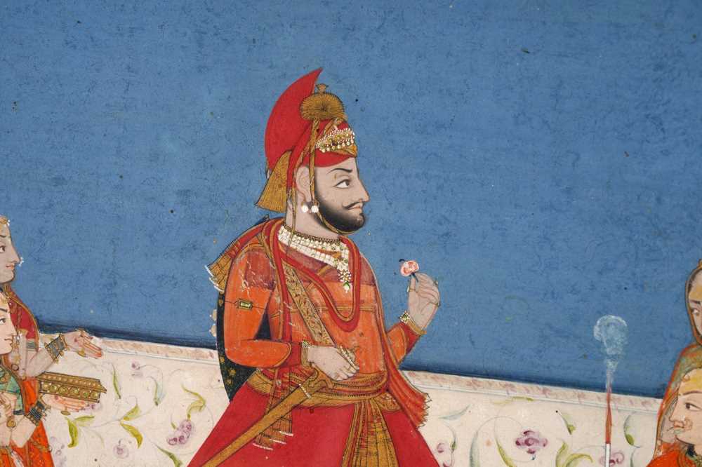 Lot 199 - A STANDING PORTRAIT OF A RAJPUT RULER WITH