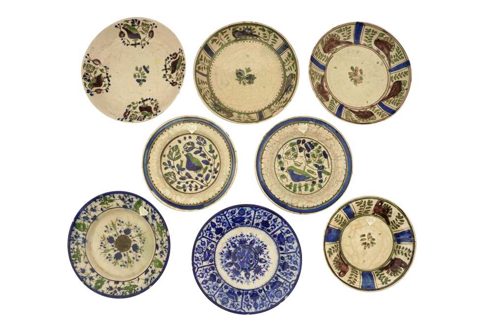 Lot 68 - EIGHT POLYCHROME-PAINTED POTTERY DISHES WITH