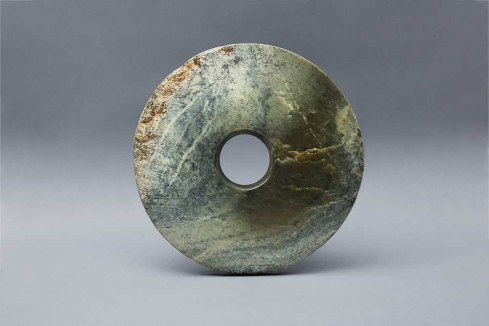Lot 347 - A LARGE CHINESE ARCHAIC JADE DISC, BI