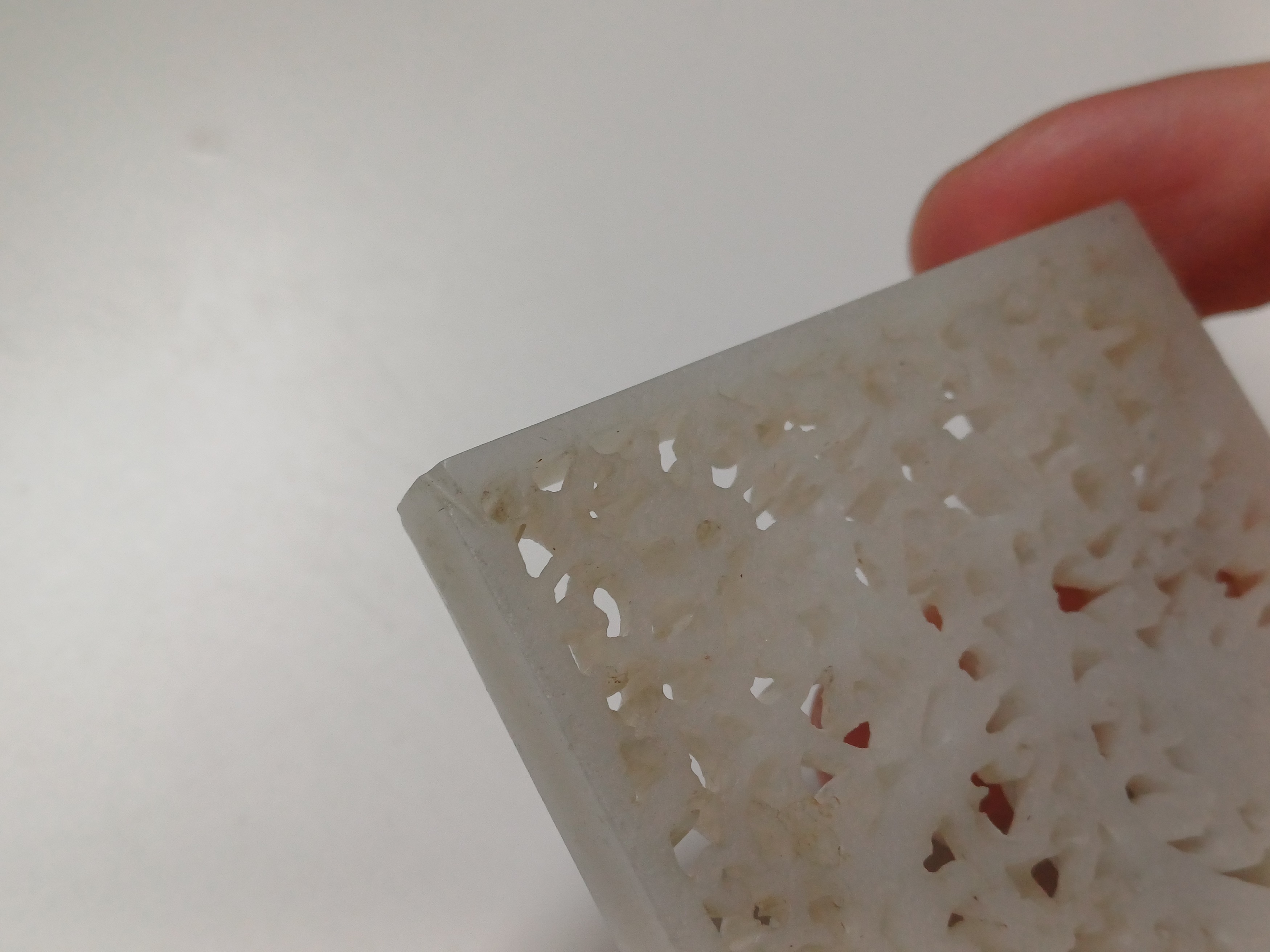 Lot 120 - A CHINESE WHITE JADE RETICULATED 'DRAGON'