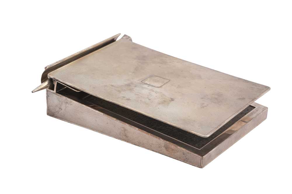 Lot 77 - AN EDWARD VIII ART DECO STERLING SILVER NOTE