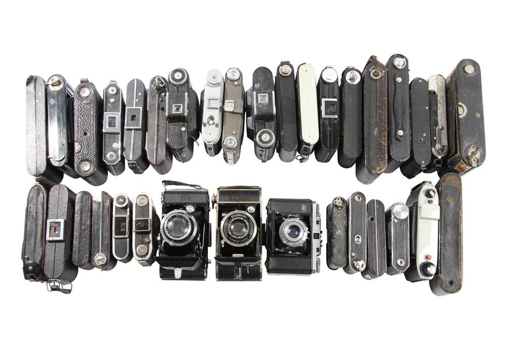 Lot 434 - A Selection of Folding Cameras.