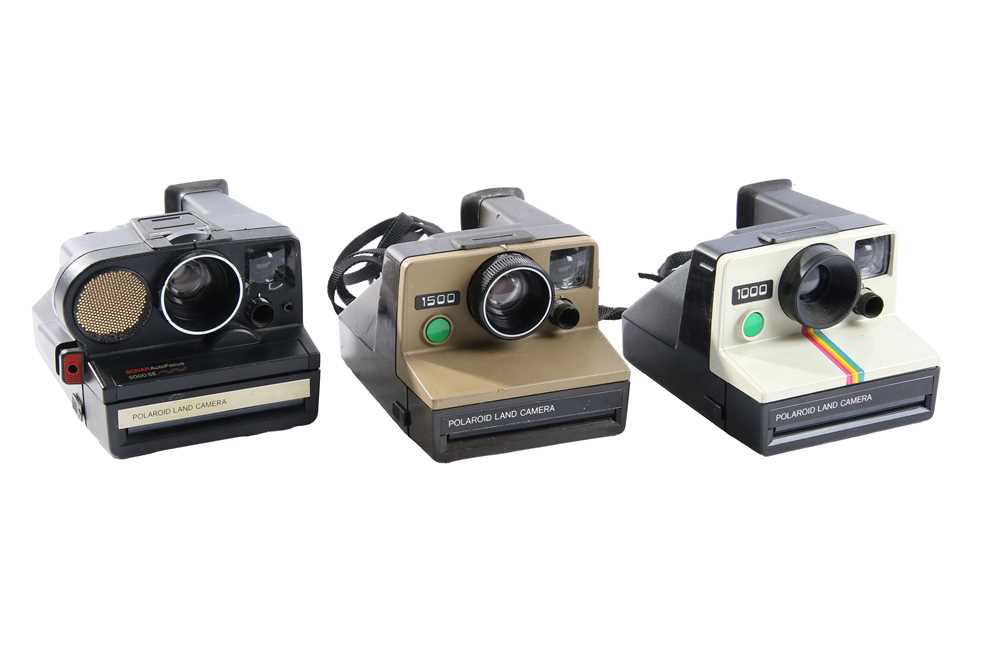 Lot 49 - Three Polaroid 600 Cameras.