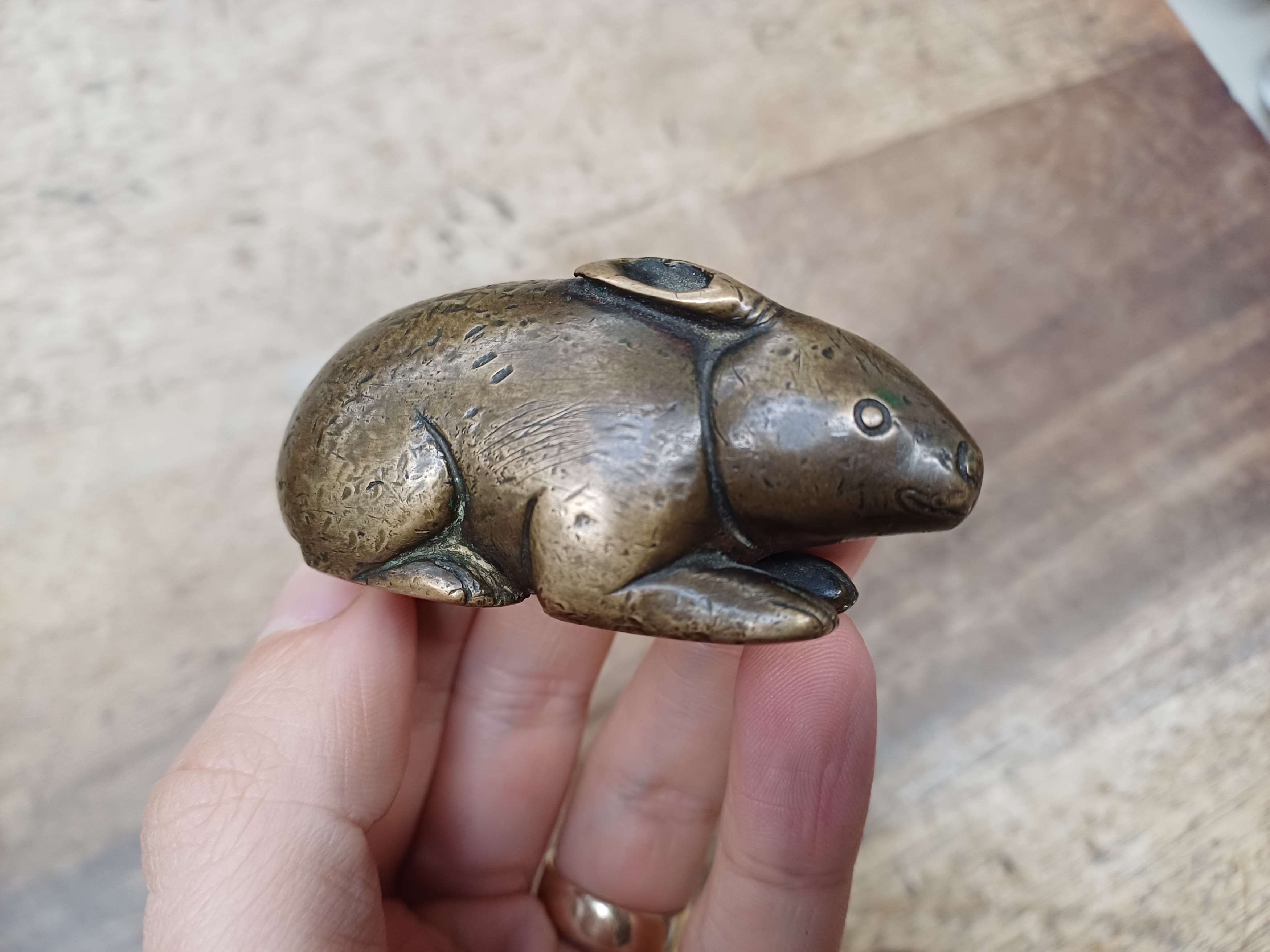 Lot 162 - A CHINESE BRONZE 'RABBIT' SCROLL WEIGHT