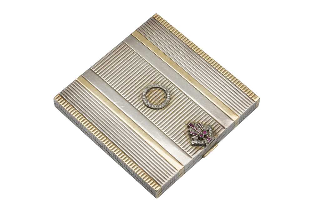 Lot 49 - A RUBY AND DIAMOND COMPACT BY ASPREY