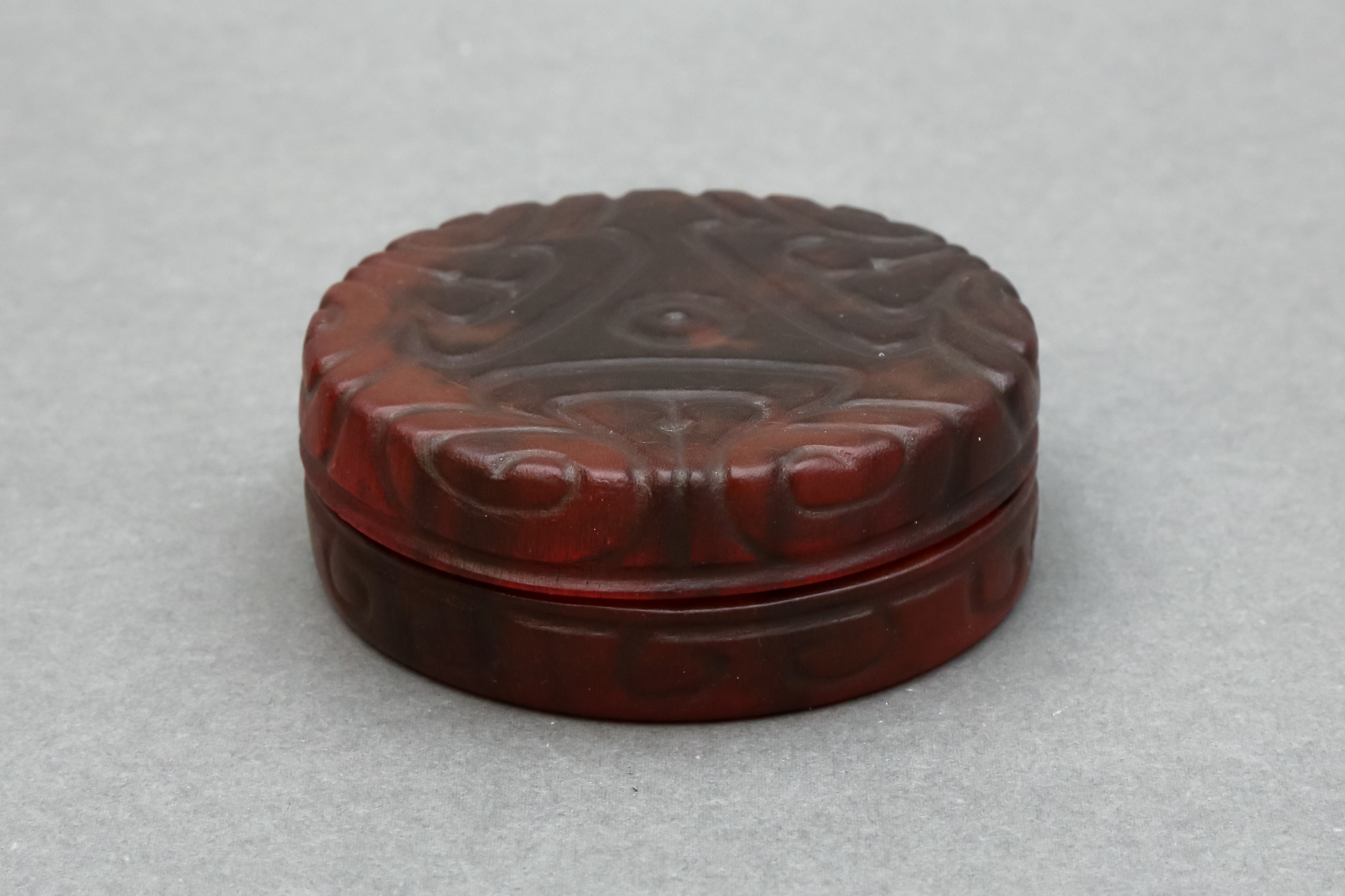 Lot 171 - A CHINESE CARVED RHINOCEROS HORN 'RUYI' BOX