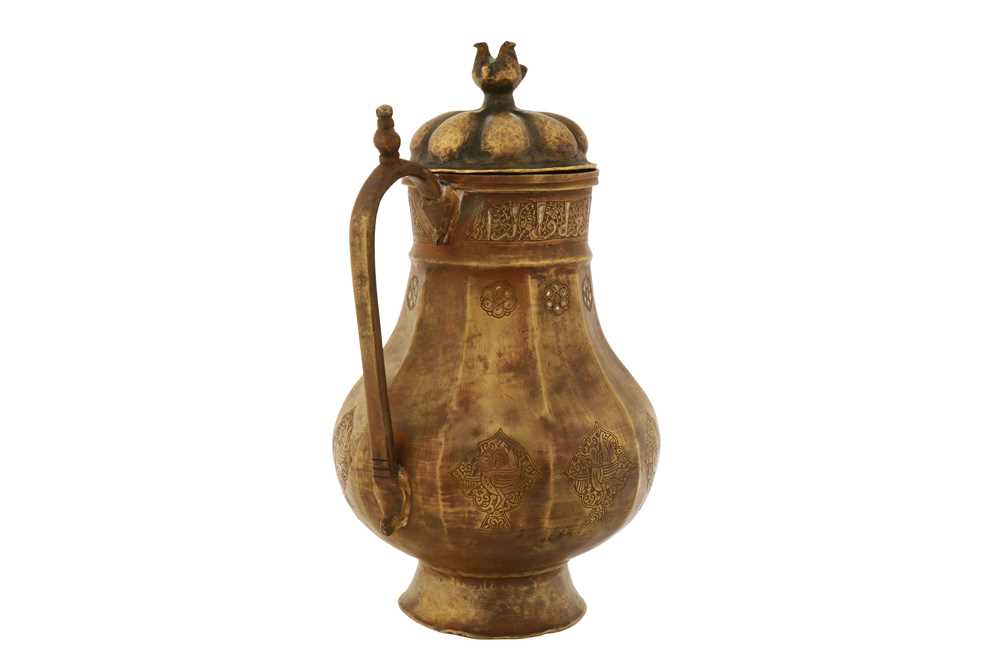 Lot 71 - A 12TH CENTURY PERSIAN SELJUQ JUG WITH SILVER