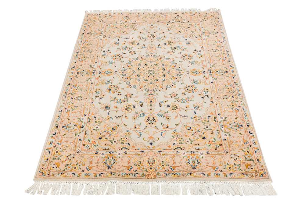Lot 9 - A FINE PART SILK AND SIGNED KASHAN RUG,