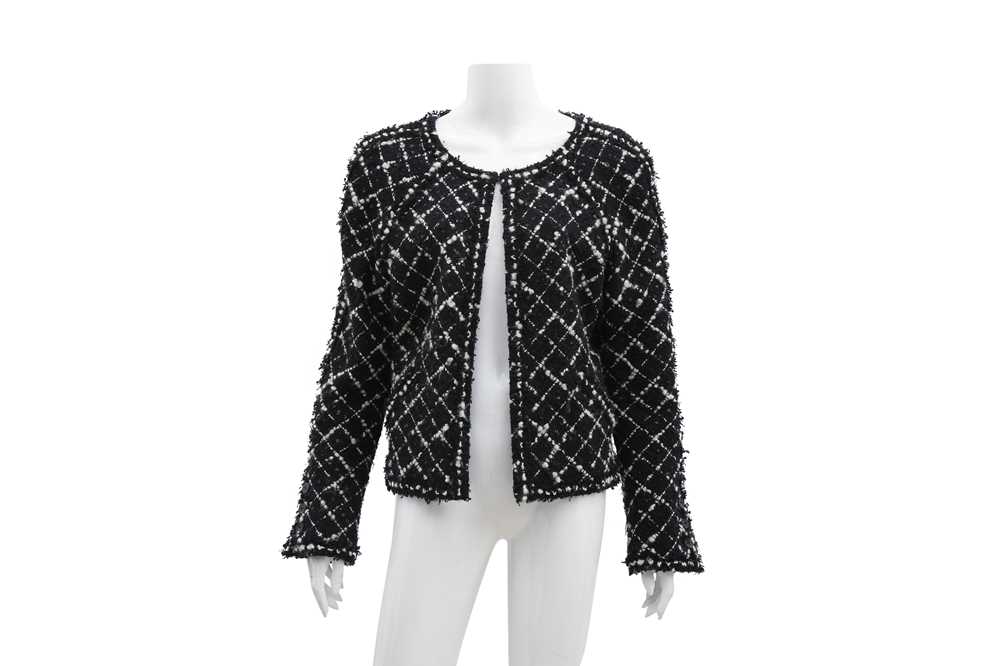 Lot 451 - Chanel Black Wool Boucle Collarless Jacket