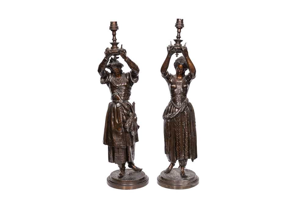 Lot 214 - A PAIR OF BRONZED FIGURAL TABLE LAMPS, EARLY