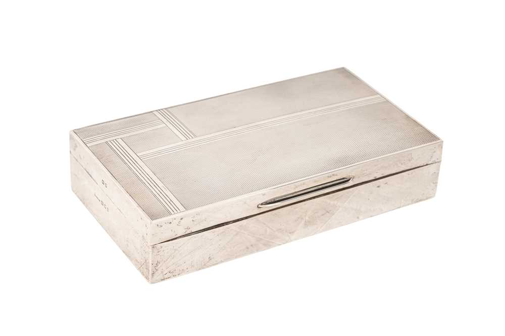 Lot 179 - A George V sterling silver cigarette box,