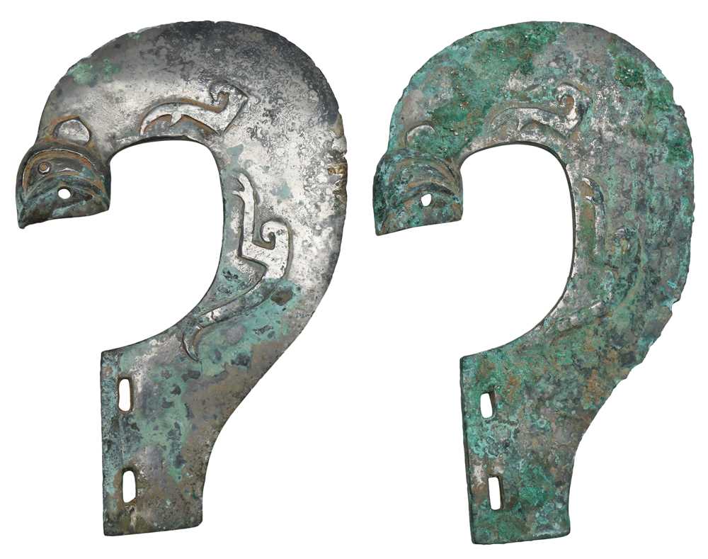 Lot 144 - A PAIR OF CHINESE ARCHAIC BRONZE AXE HEADS,