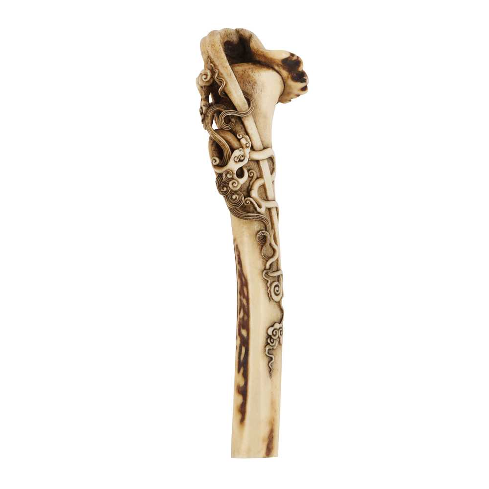 Lot 58 - A Japanese sashi-netsuke of a scepter in the